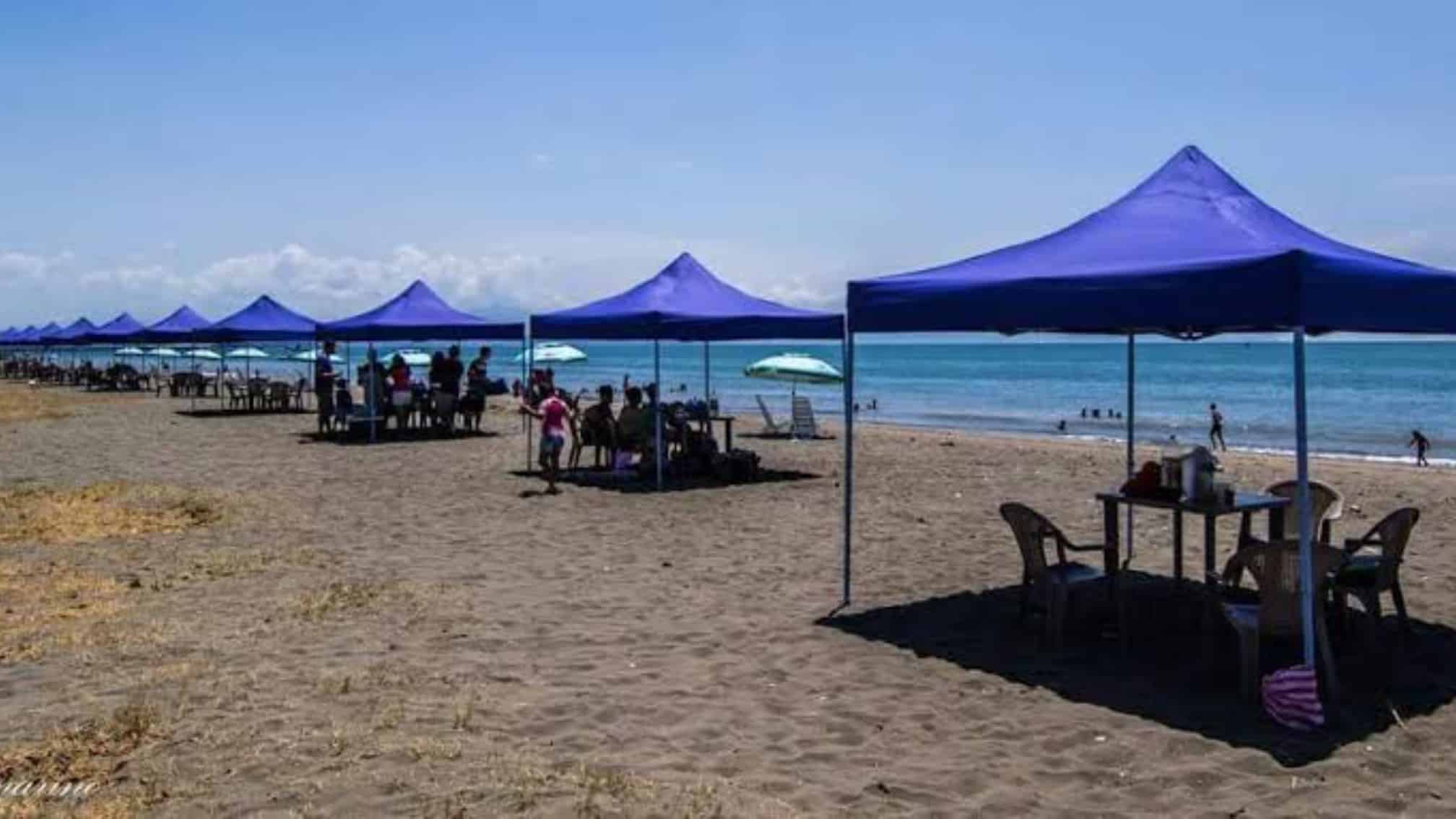 Guía para Elegir el Toldo Perfecto para Disfrutar en la Playa - Cover Prime